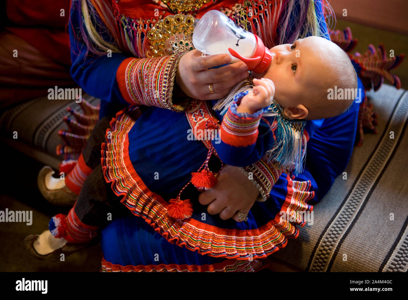 Laplander mother feeding baby. Lapp / Lapps / Laplander / Laplanders ...