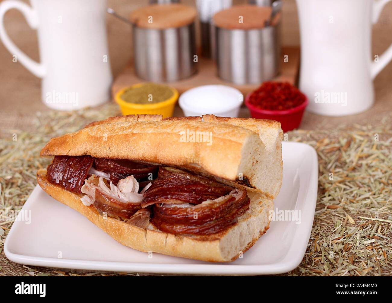 Close up of quarter bread plenty of spicy master kokoreç Stock Photo ...
