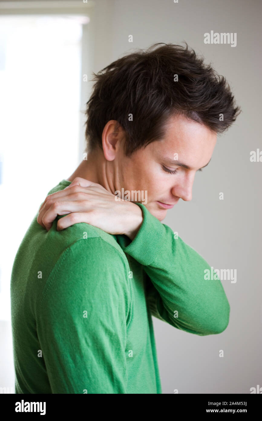 Scratching back person hi-res stock photography and images - Alamy