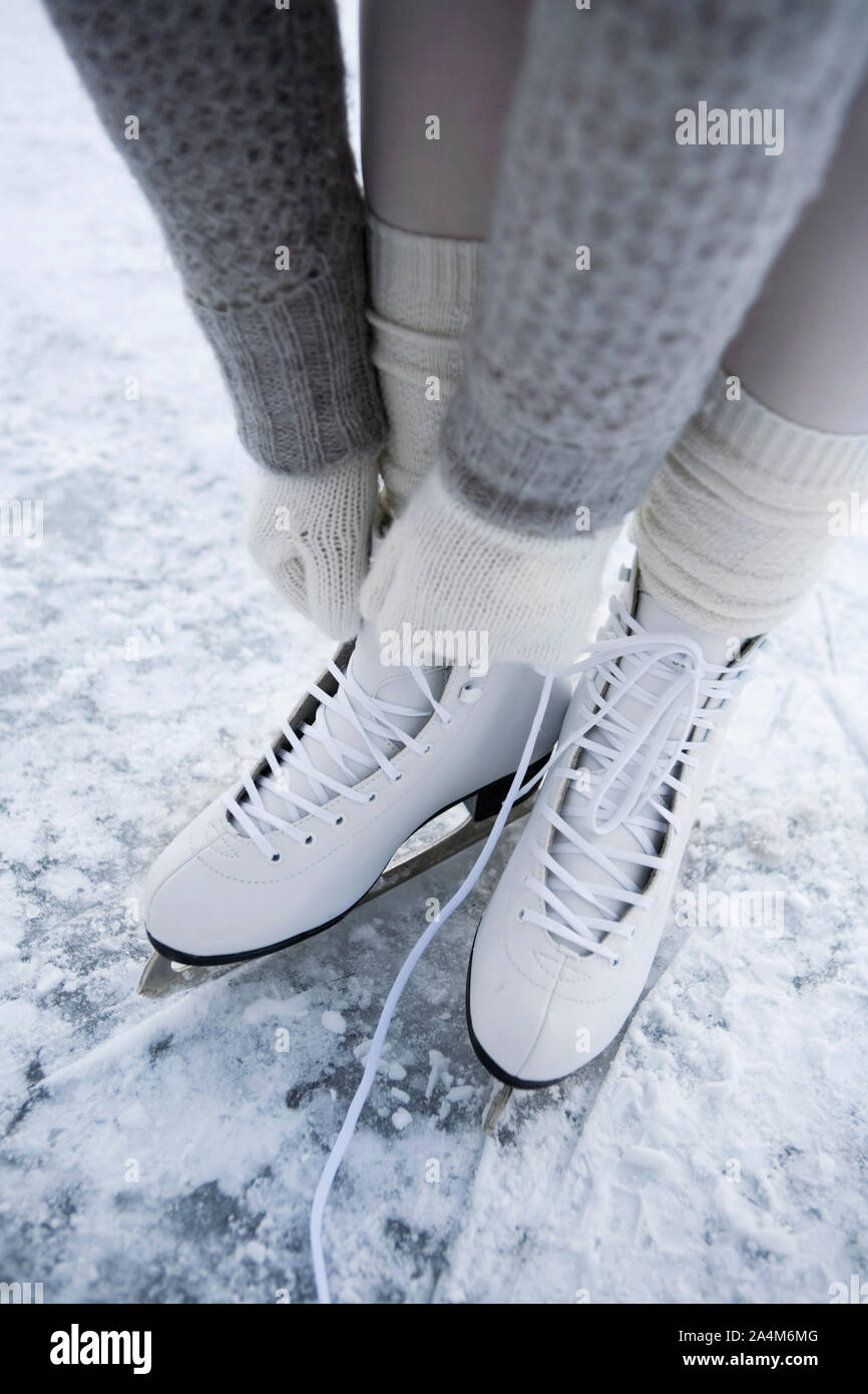 Woman ice skating Stock Photo - Alamy