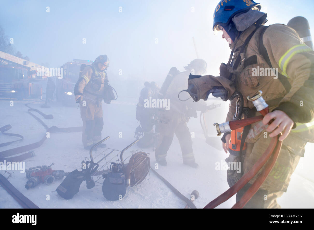 Firemen at work Stock Photo - Alamy