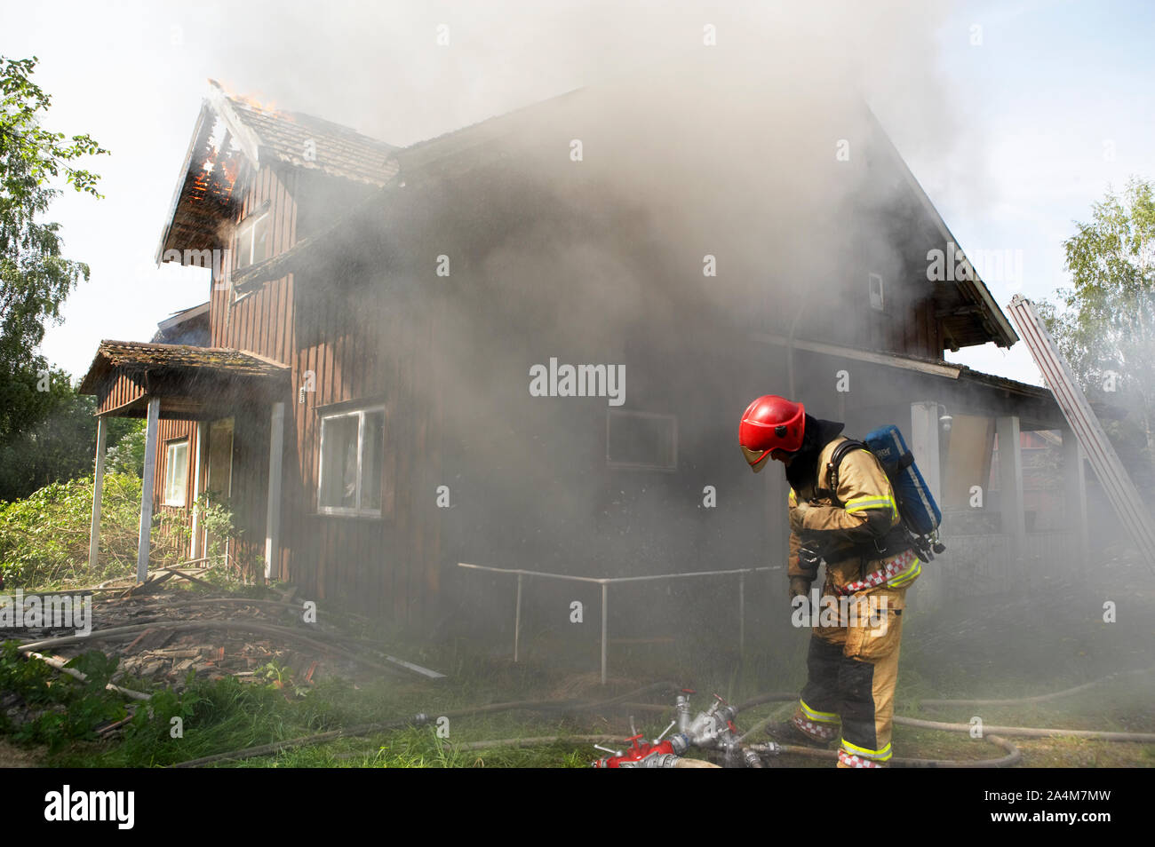 Firemen at work Stock Photo - Alamy