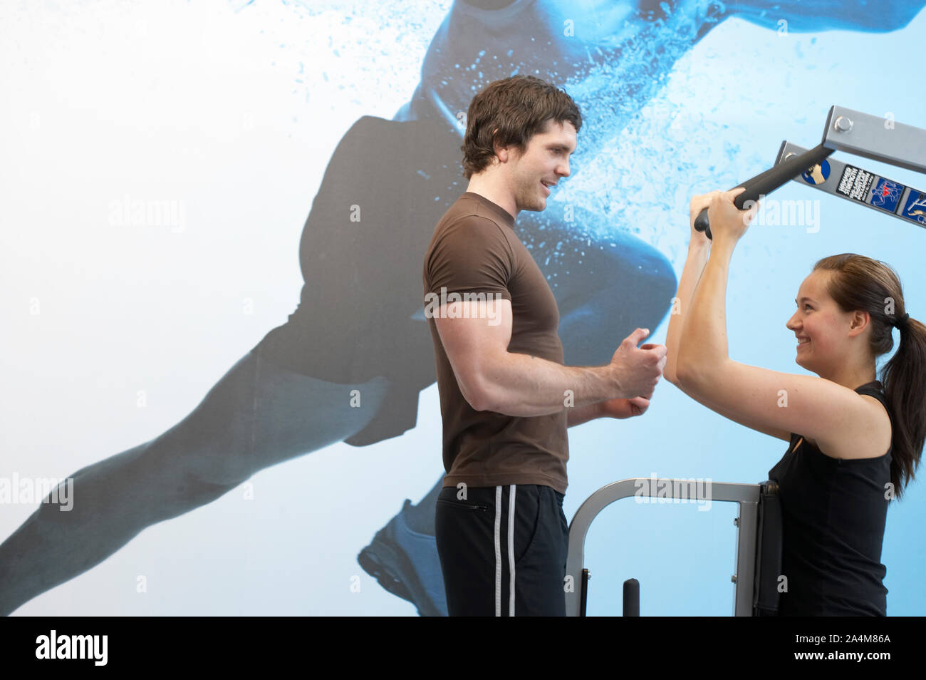 Flirting in gym hi-res stock photography and images - Alamy