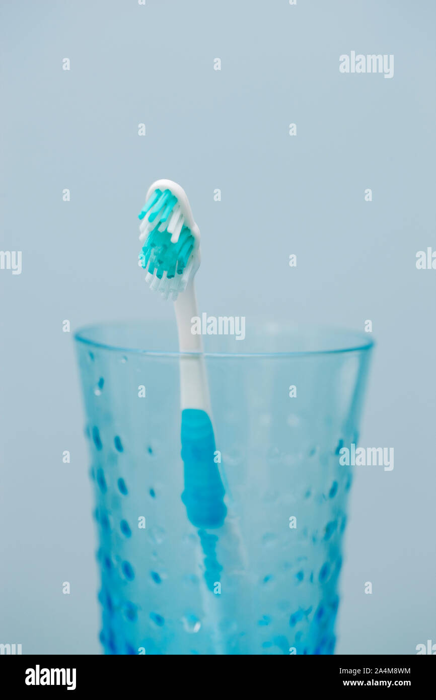 Toothbrush in glass Stock Photo - Alamy