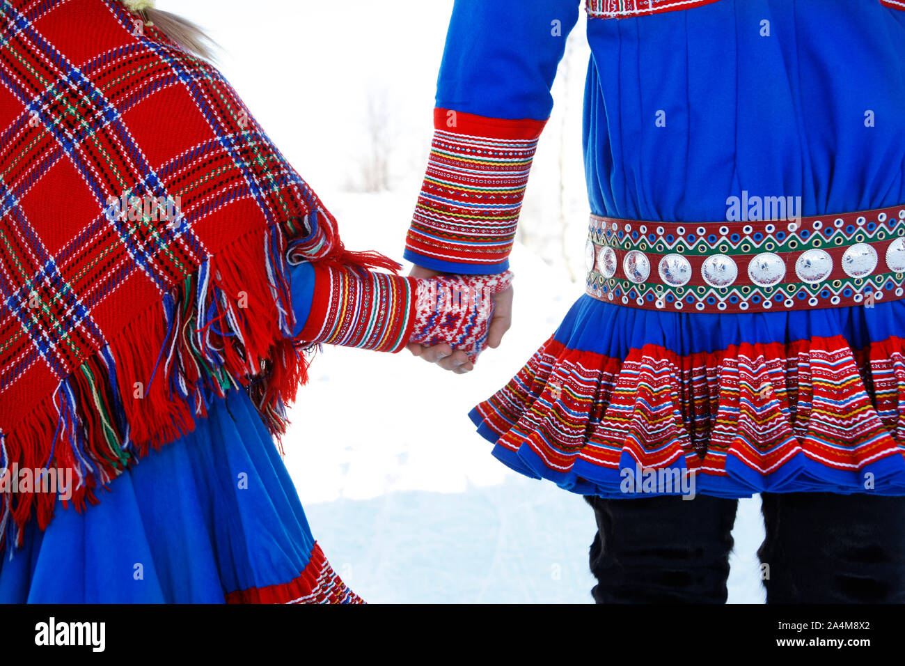 Laplander girl holding brothers hand. Lapp / Lapps / Laplander ...