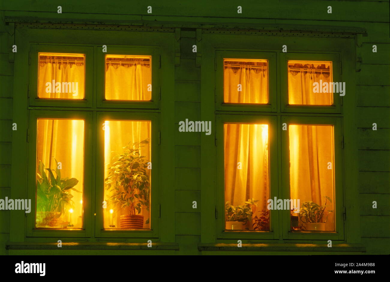 Windows at night Stock Photo - Alamy