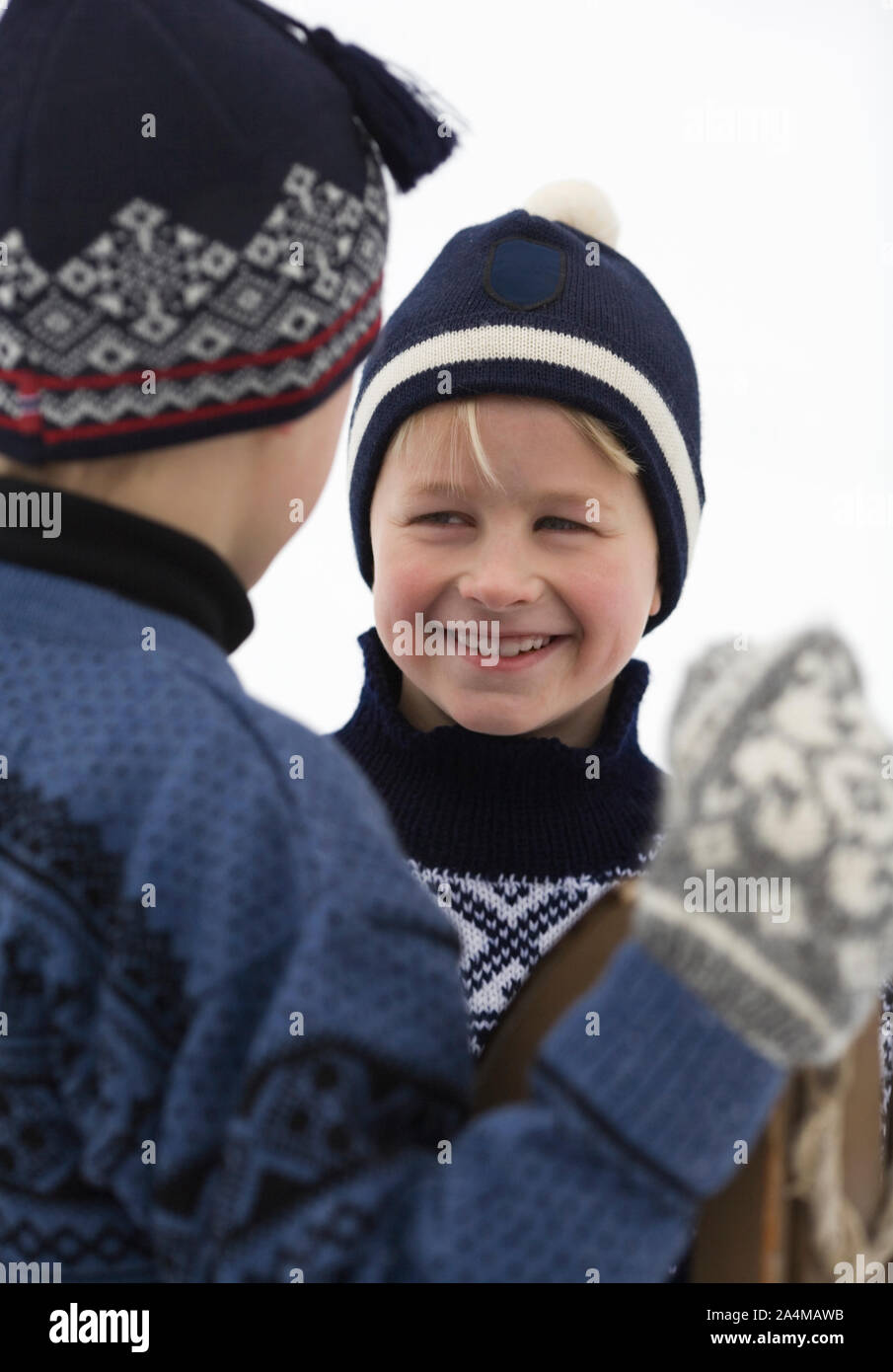 Boys throwing snowballs hi-res stock photography and images - Alamy