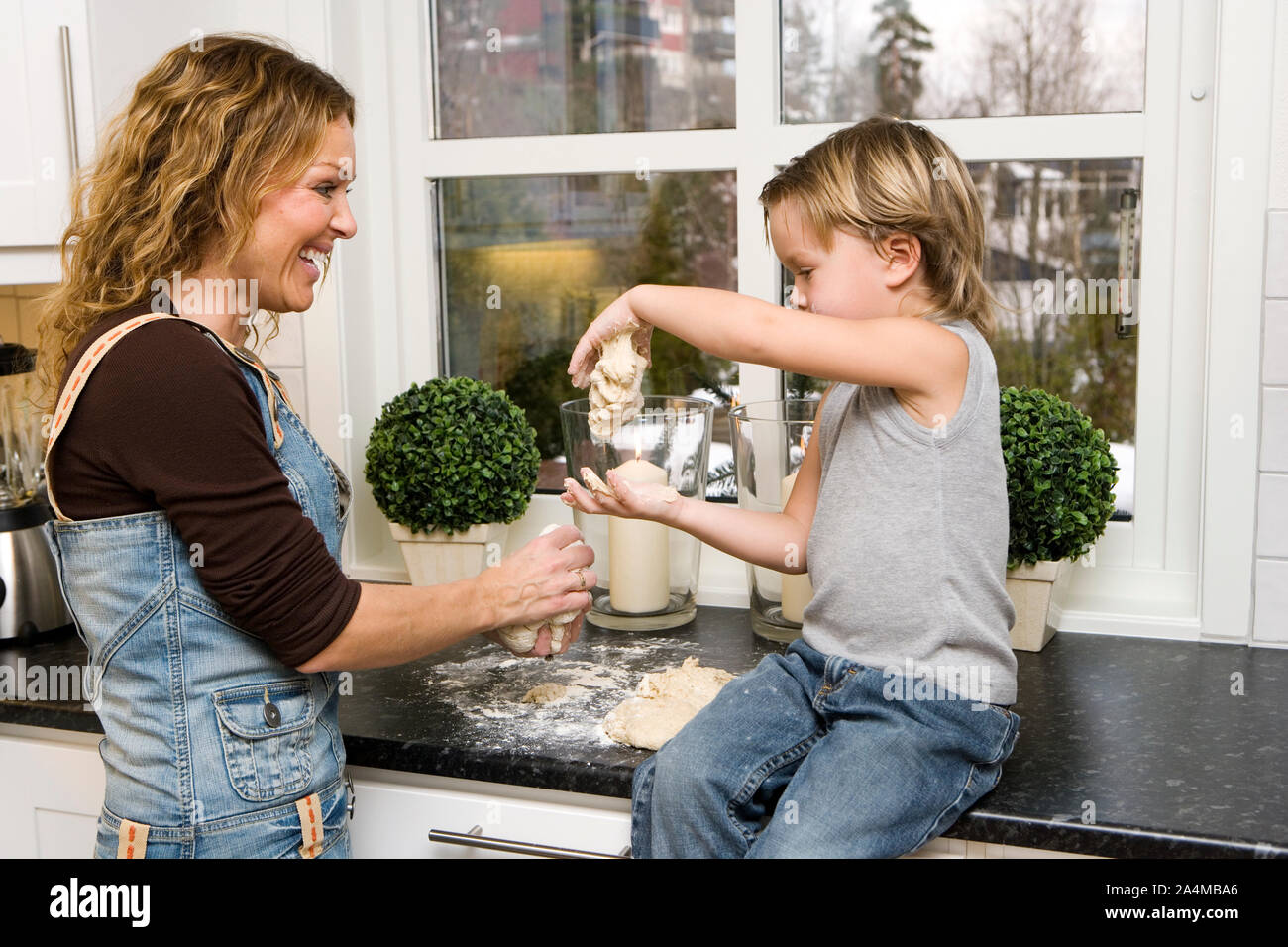 Mother and son baking Stock Photo - Alamy