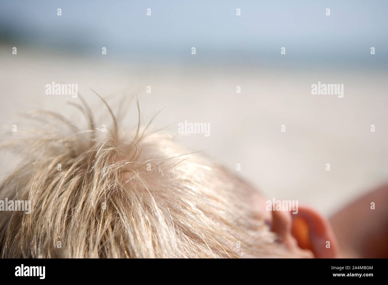 Boys sunbathing hi-res stock photography and images - Alamy