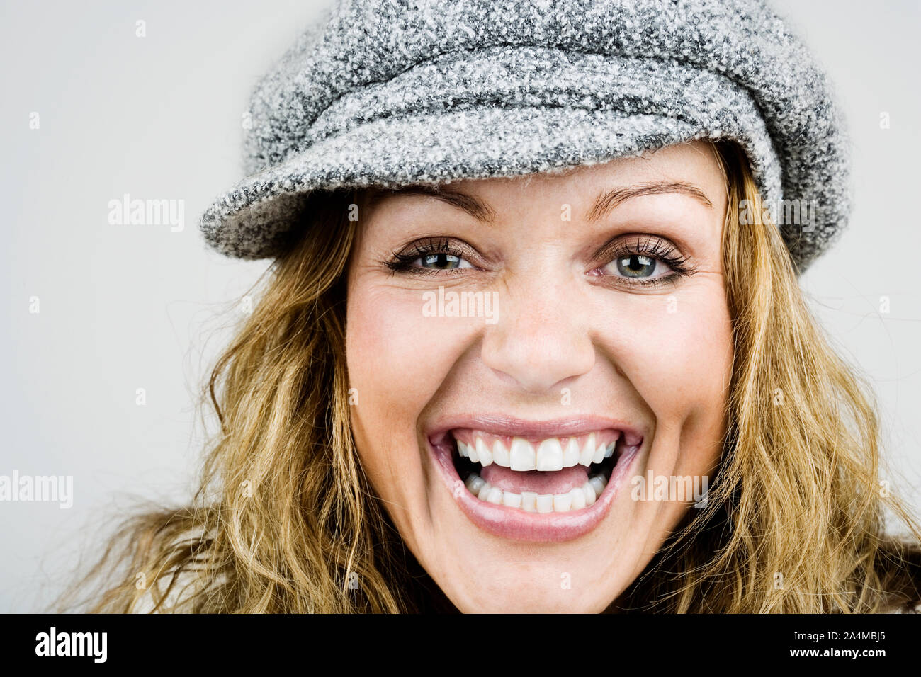Woman with caps Stock Photo - Alamy