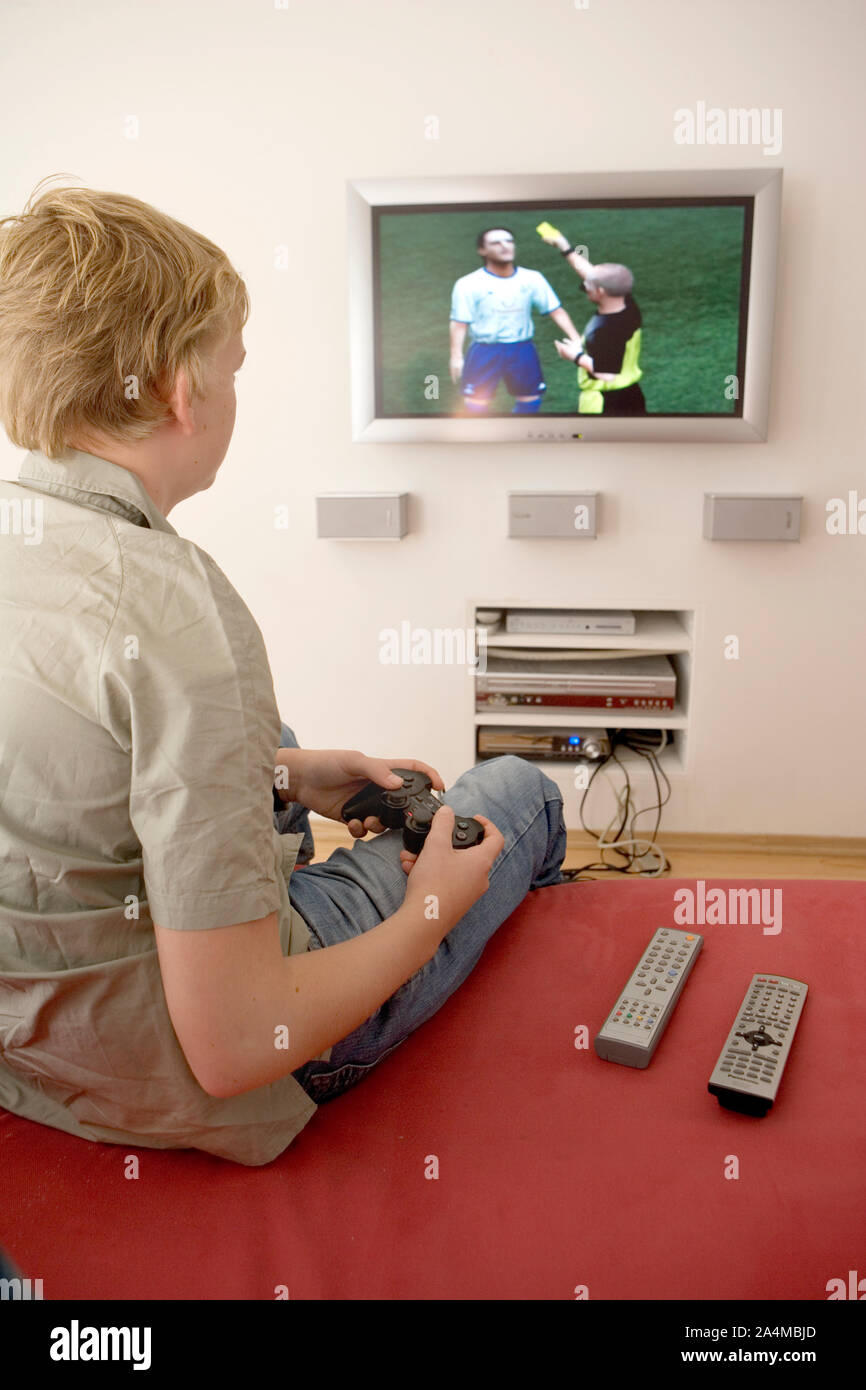 Watching tv - yellow card Stock Photo - Alamy