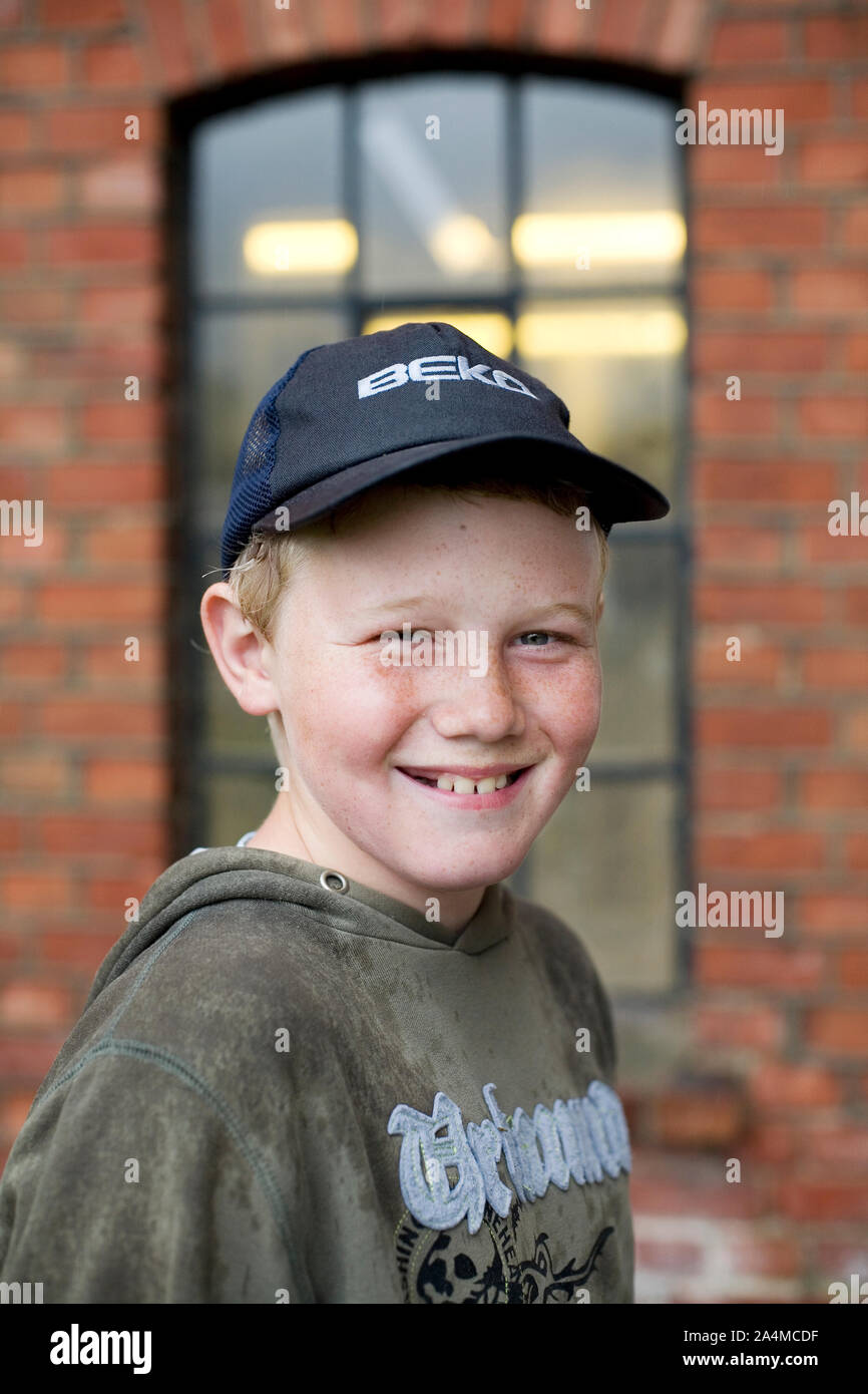 Boy with caps Stock Photo - Alamy