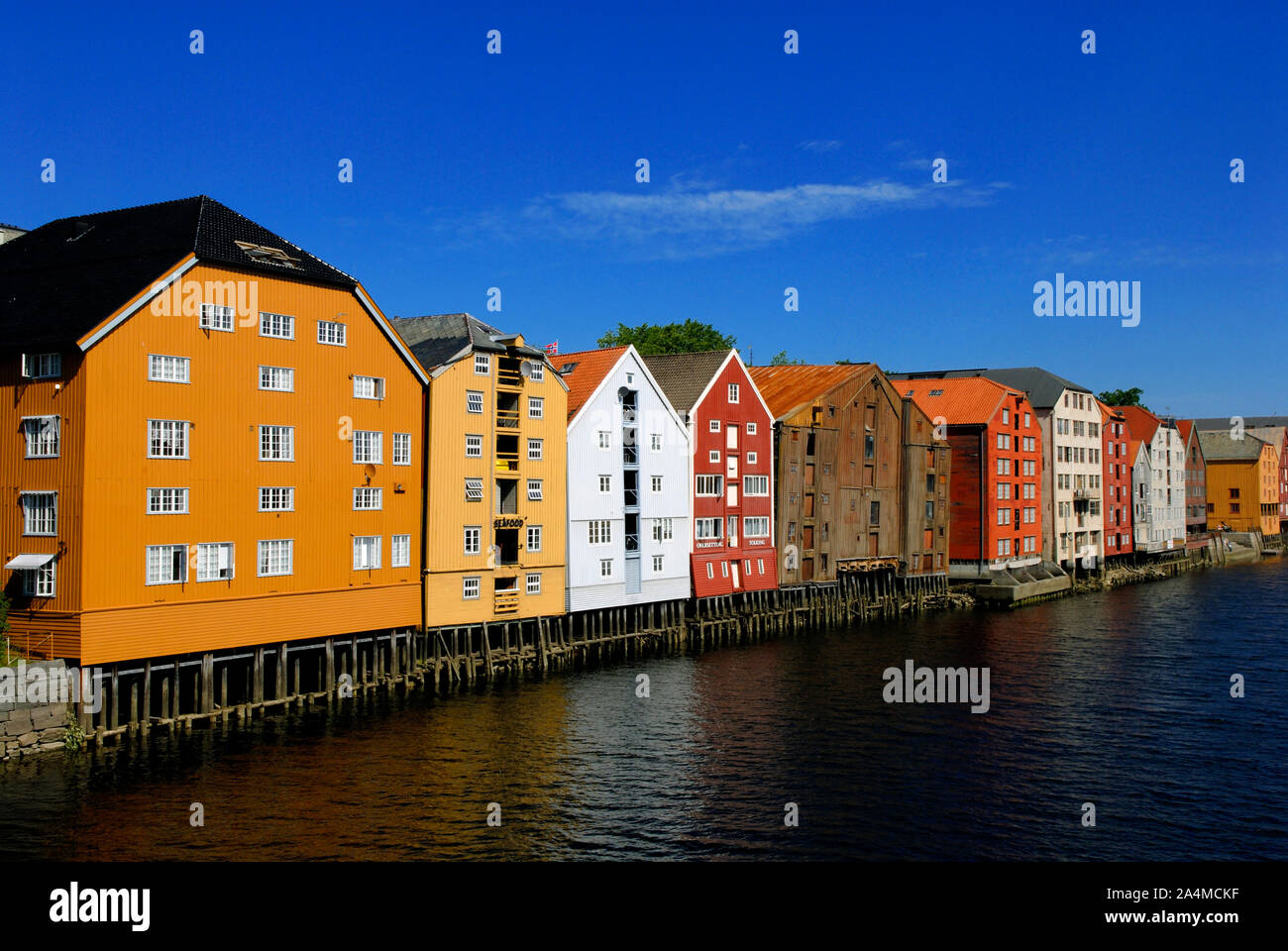 Old warehouses by Nidelven river. - the oldest from 18th century Stock ...