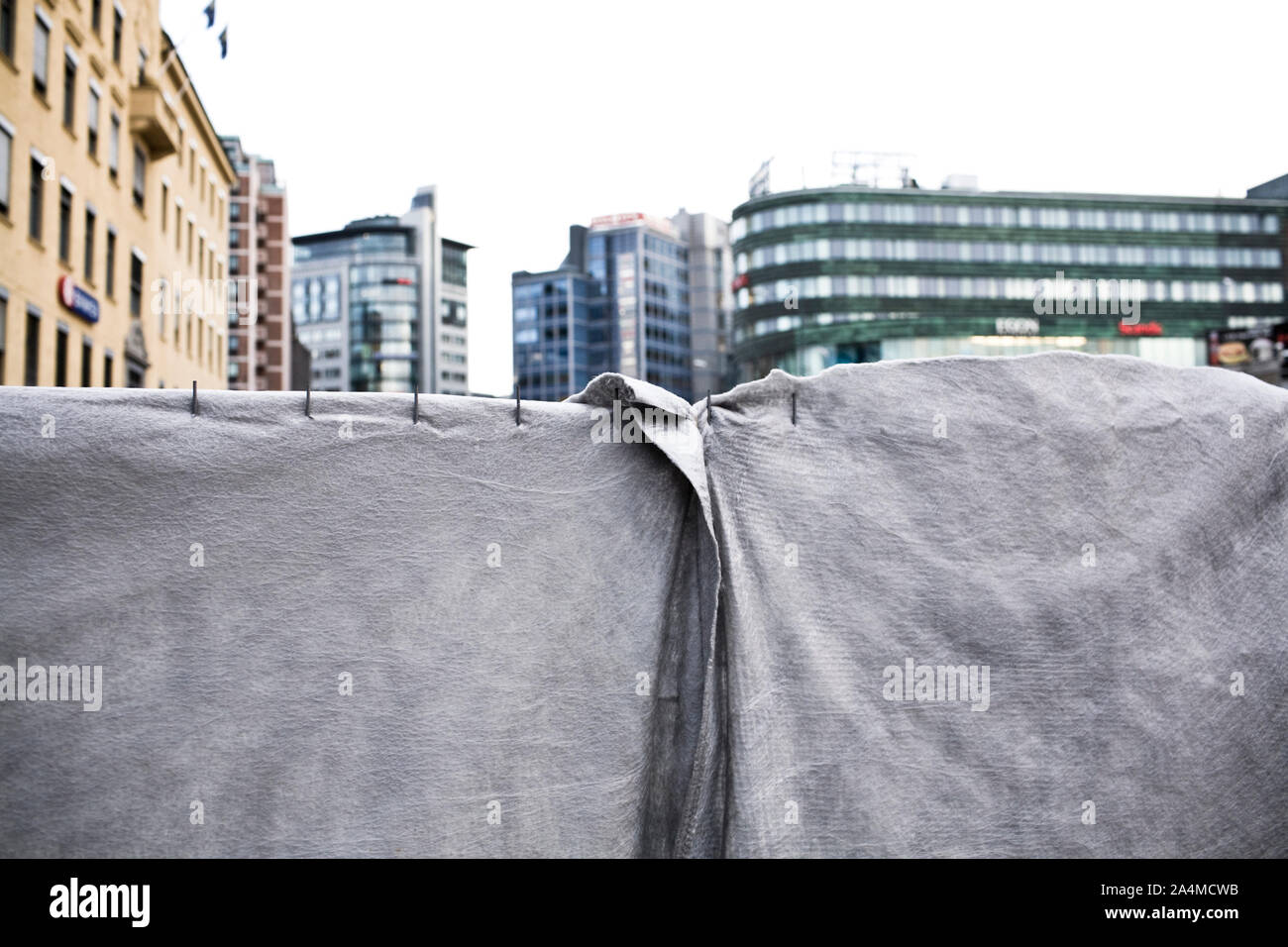 Buildings in Oslo behind grey cover Stock Photo - Alamy