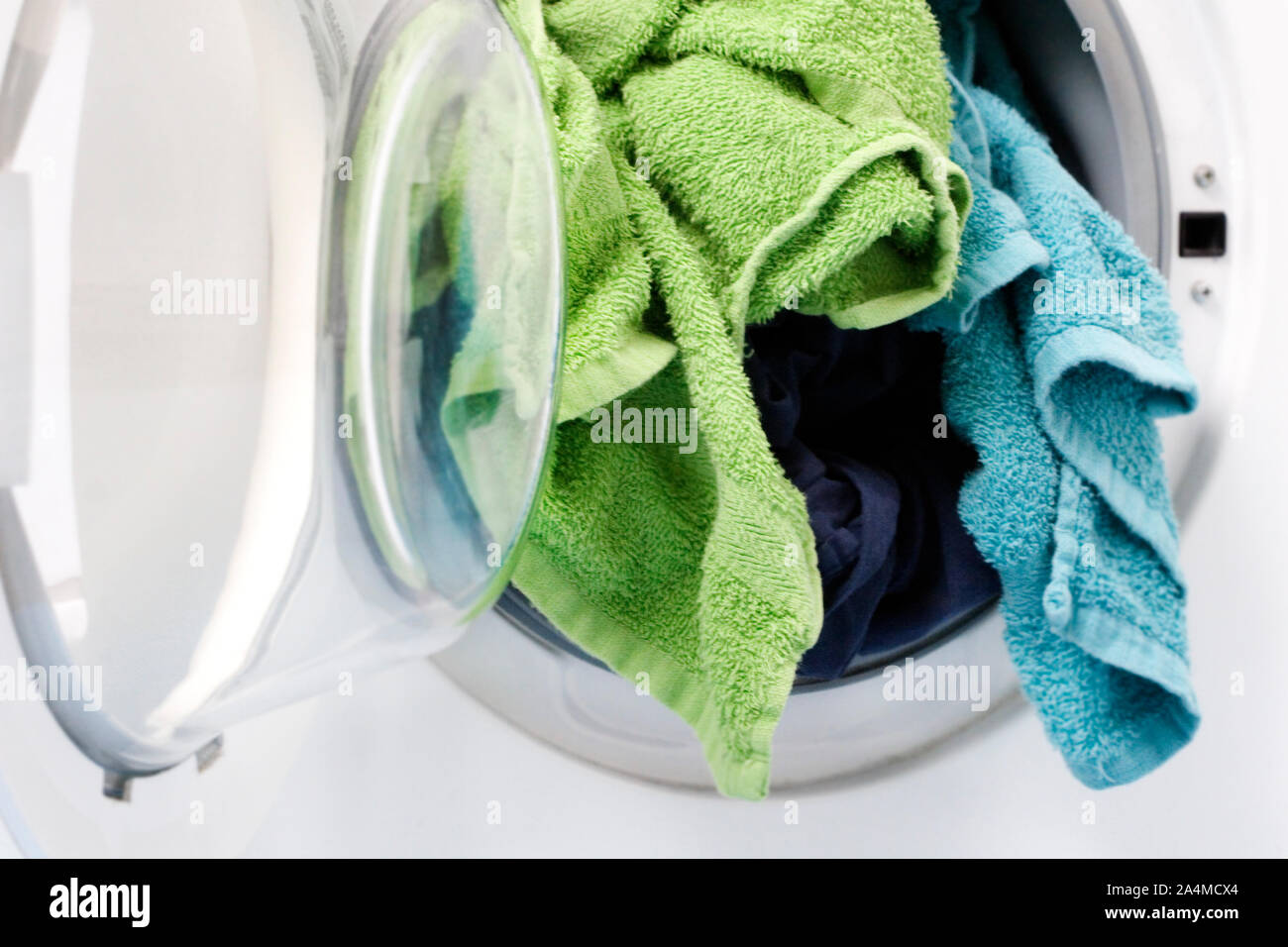 Laundry in washing machine Stock Photo - Alamy