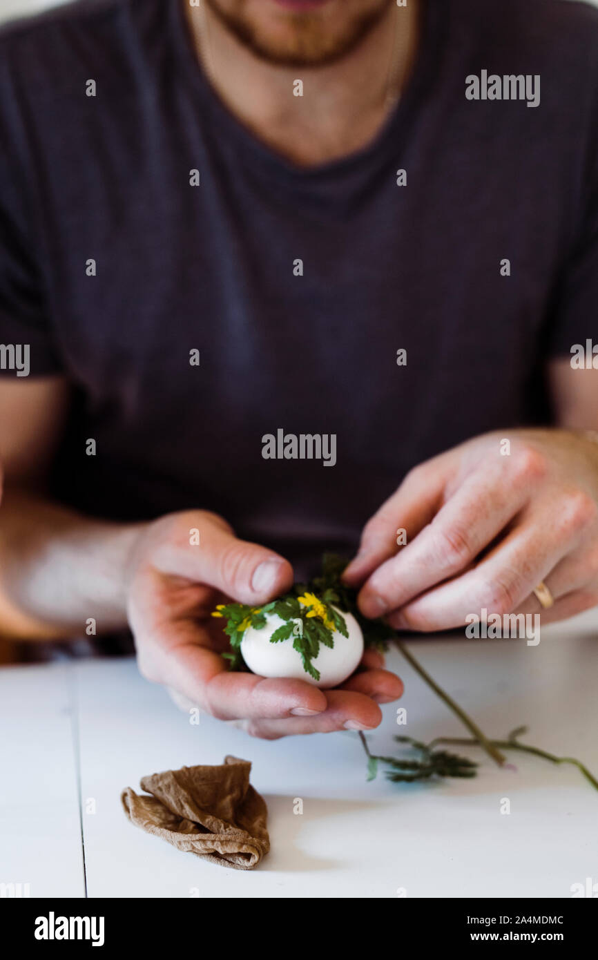 Man holding easter egg hi-res stock photography and images - Alamy