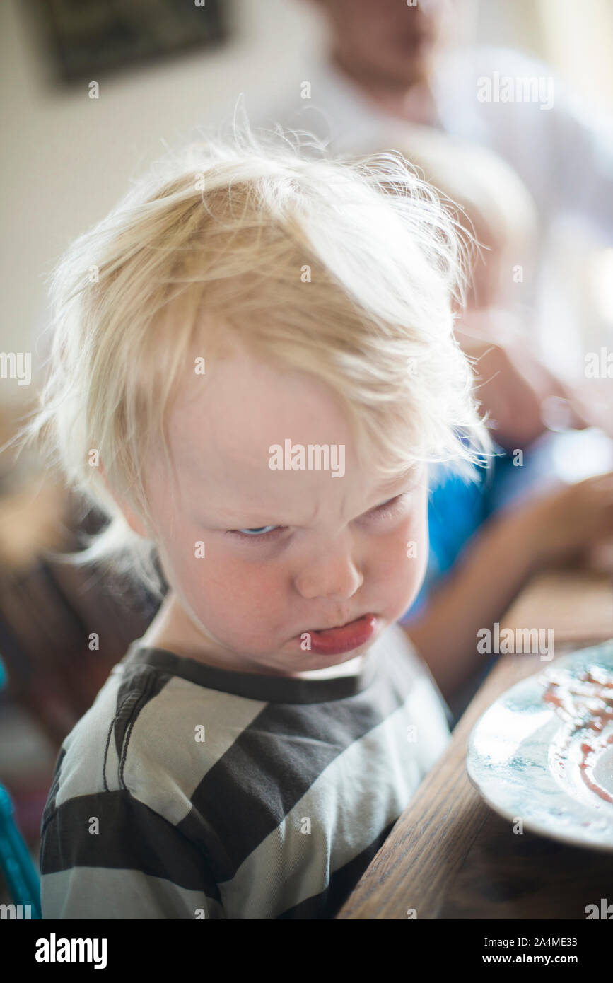 Boy making face Stock Photo - Alamy