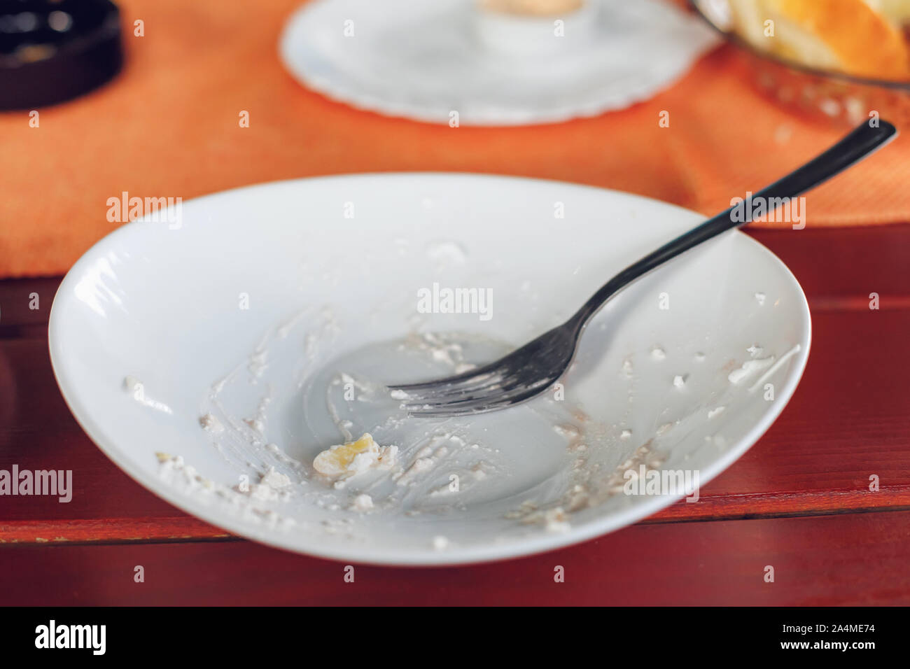 White empty and dirty dish with crumbs of food in restaurant Stock ...