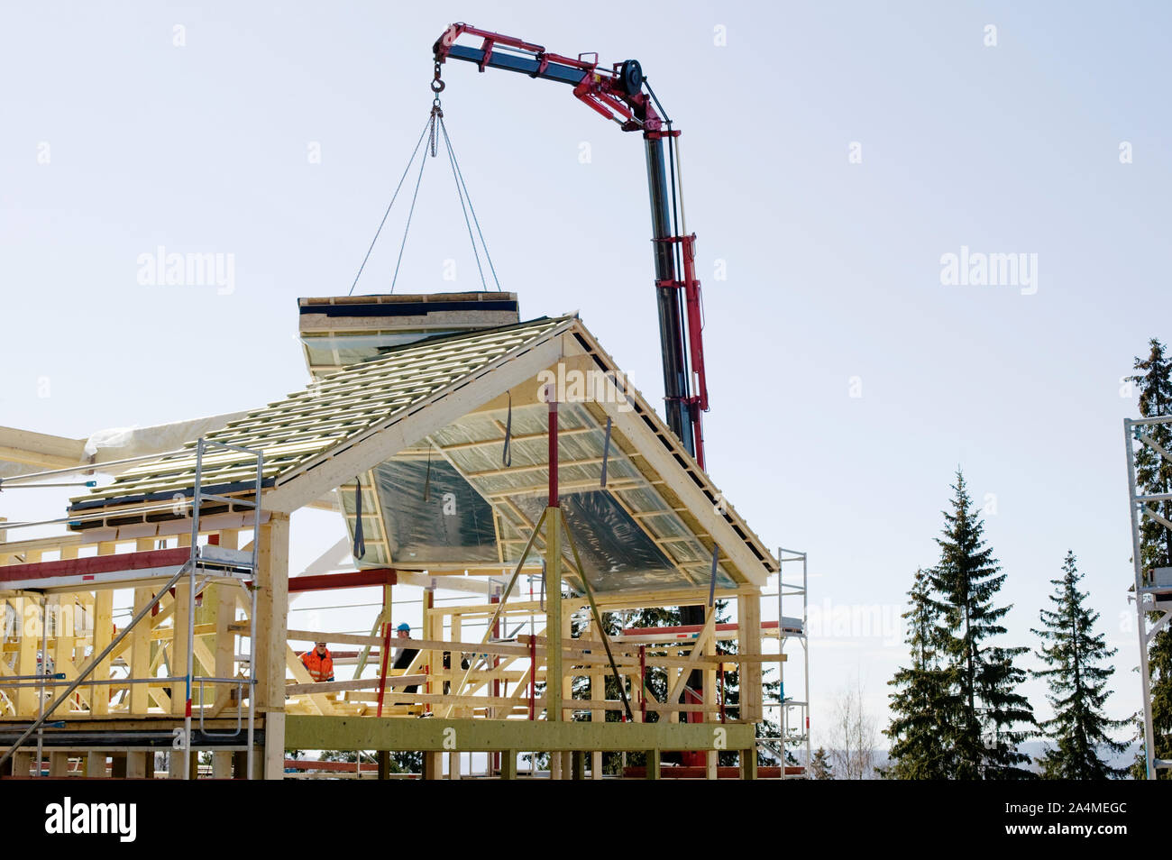 Men constructing a house - building elements Stock Photo - Alamy