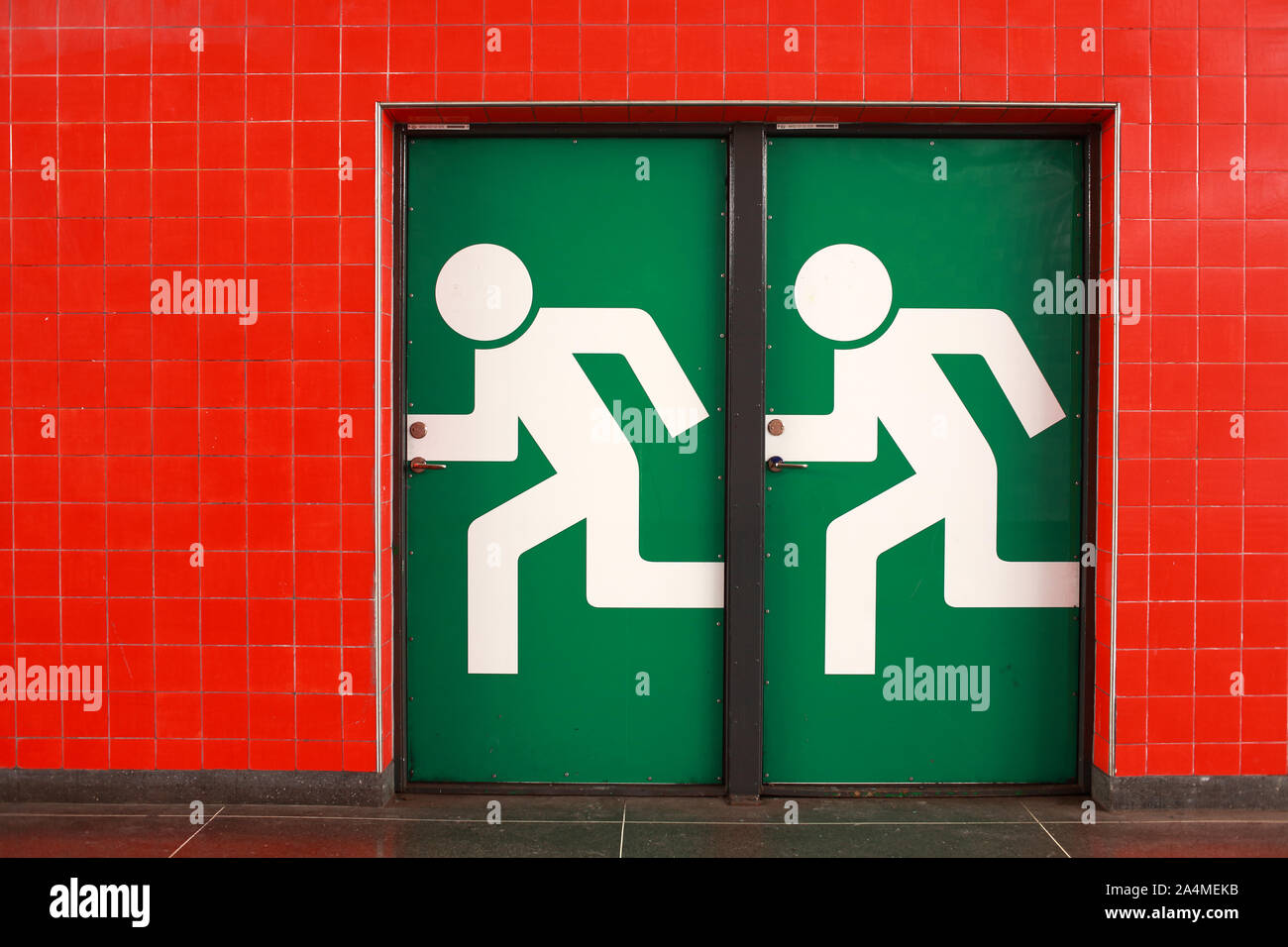 Exit sign on door Stock Photo - Alamy