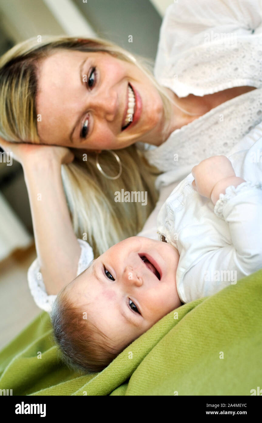 Mother and baby at home Stock Photo - Alamy