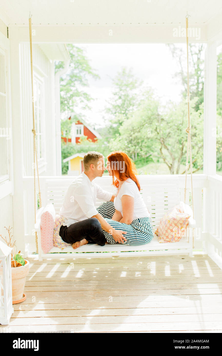 Couple Porch Swing Two People High Resolution Stock Photography and ...