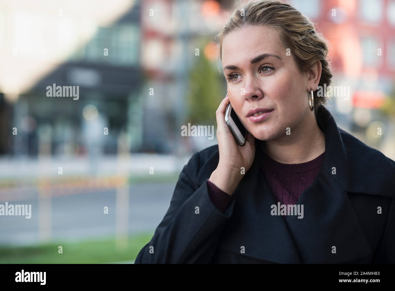 Blonde business woman on phone hi-res stock photography and images - Alamy