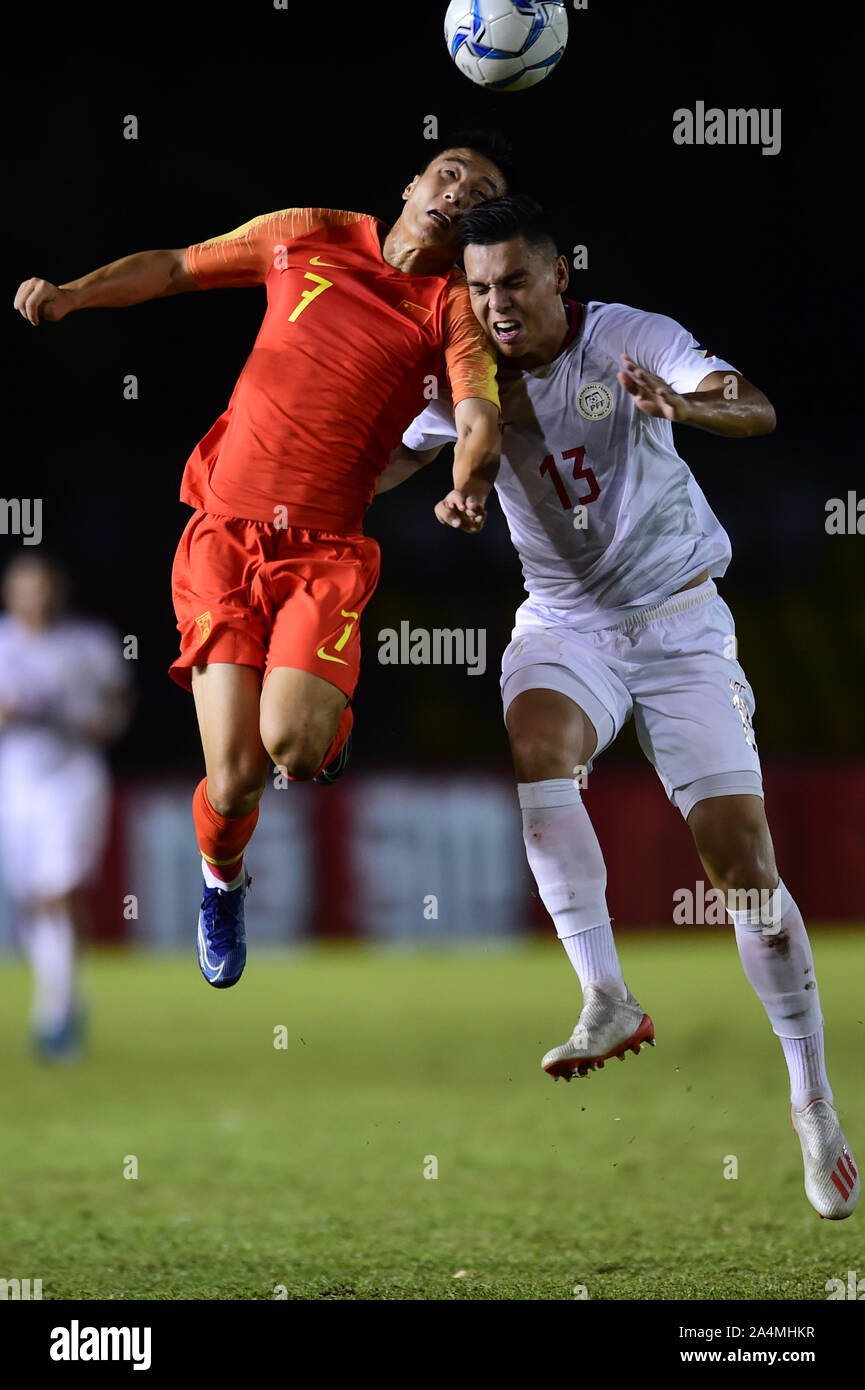 Bacolod, Philippines. 15th Oct, 2019. Wu Lei (L) of China and Mikel ...