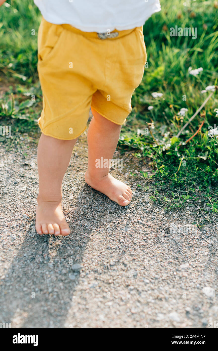 Childs barefoot hi-res stock photography and images - Alamy