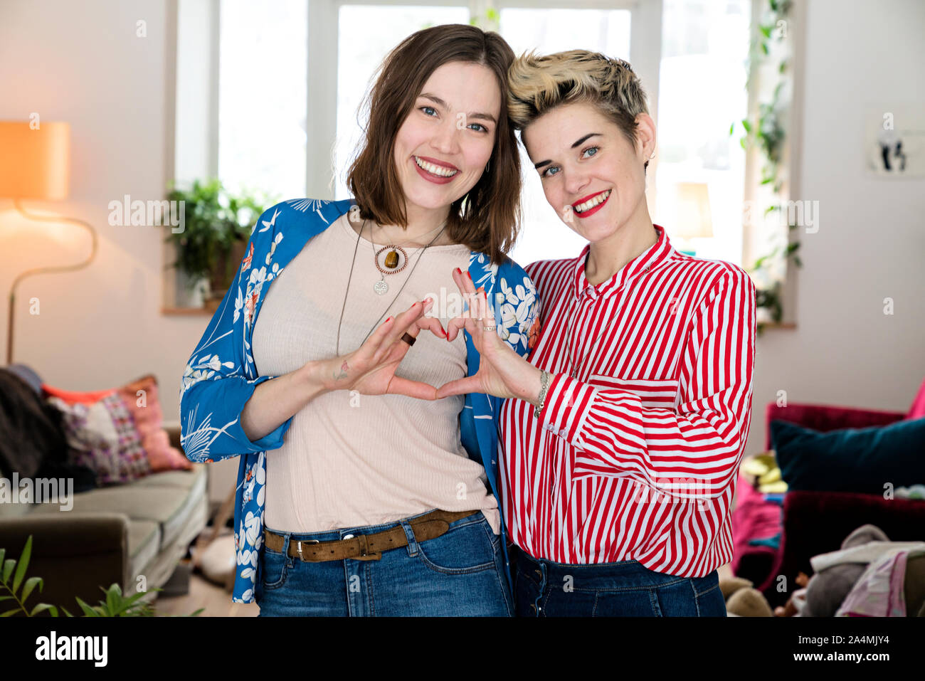 Female friends together Stock Photo - Alamy