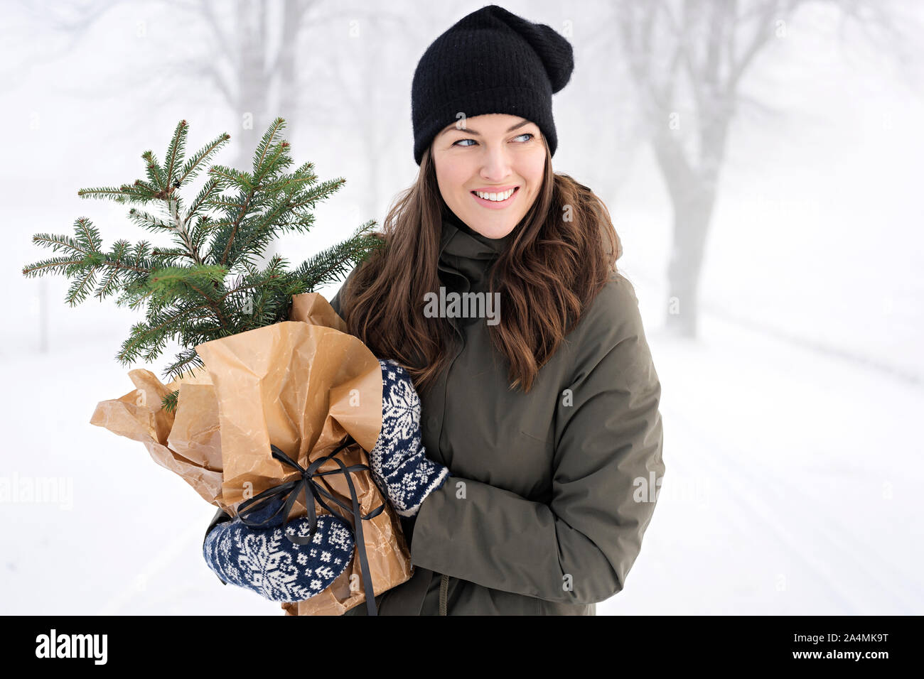 Woman small pine tree hi-res stock photography and images - Alamy