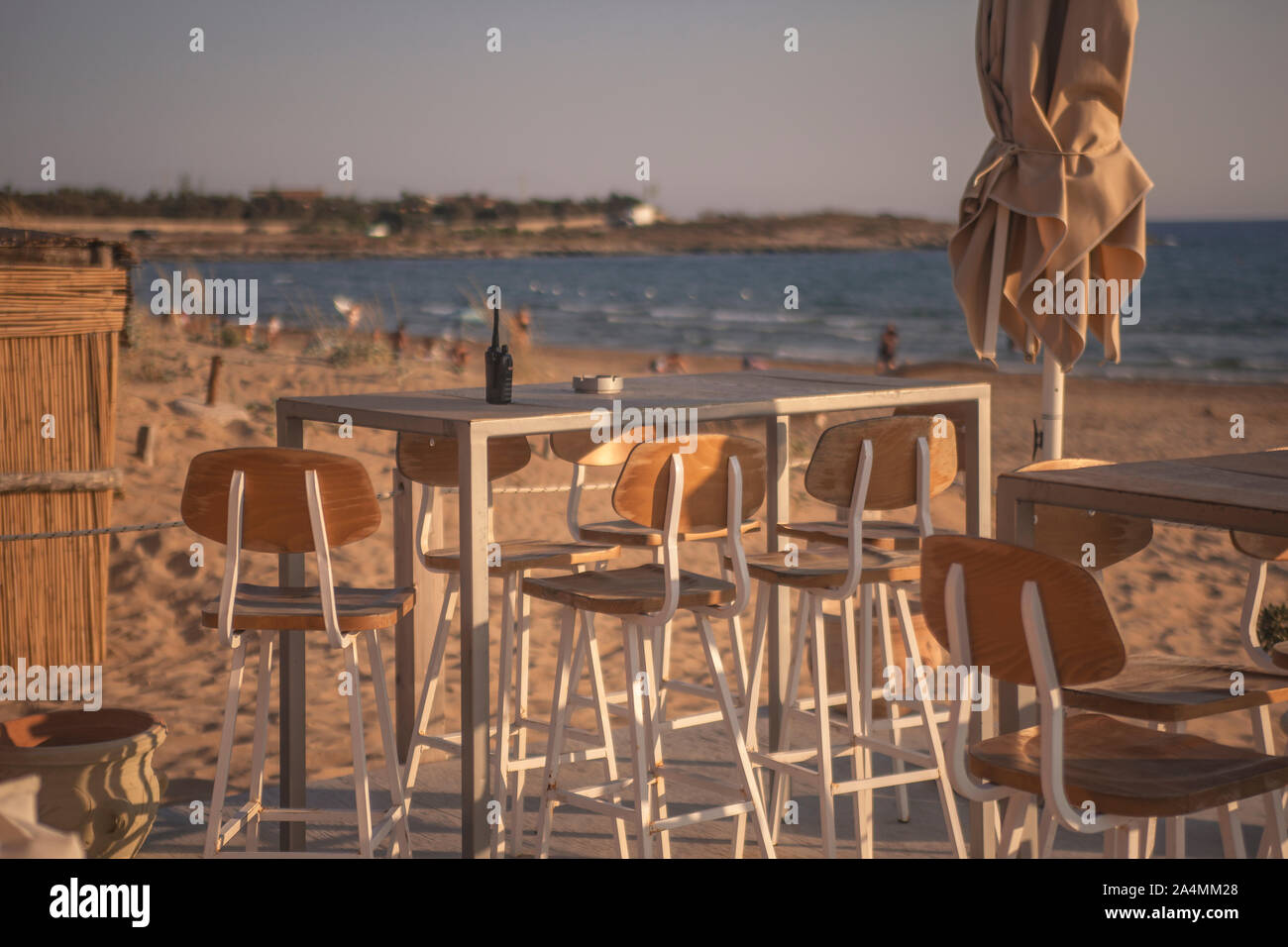 Small tables in the beach bar Stock Photo - Alamy