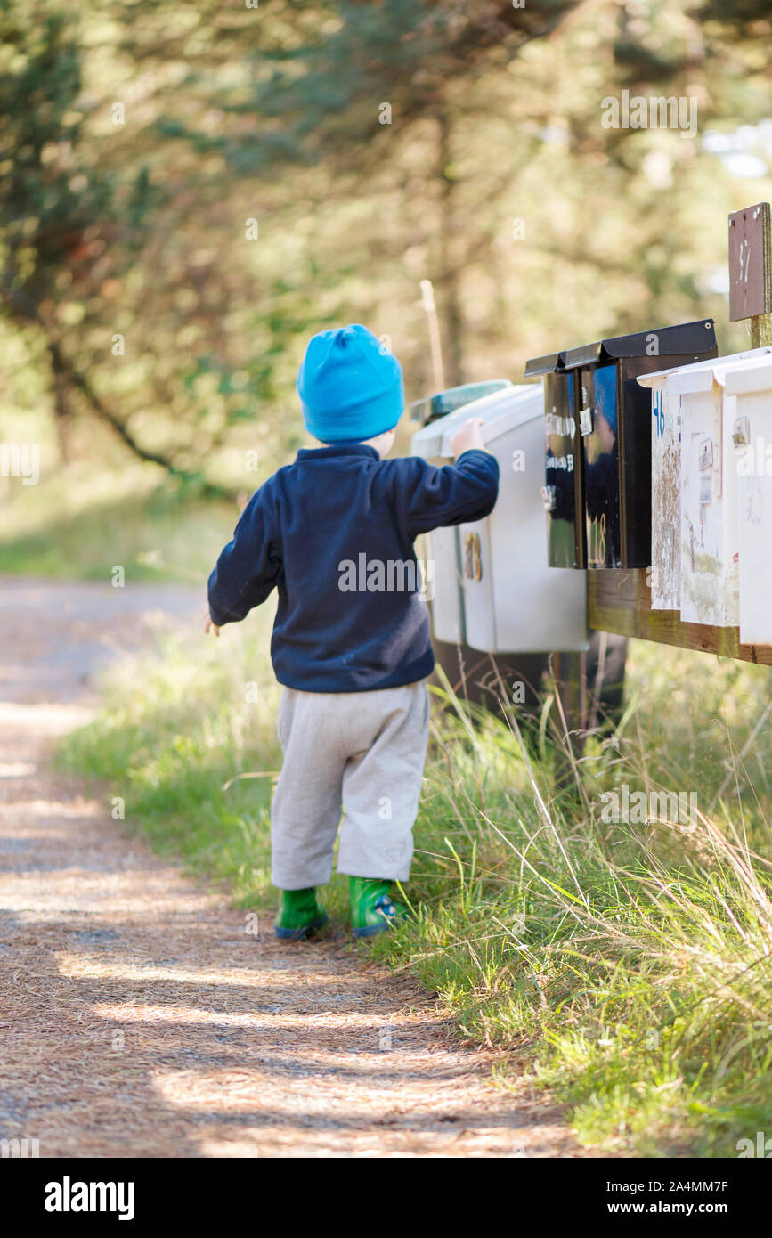Child checking mail box Stock Photo - Alamy