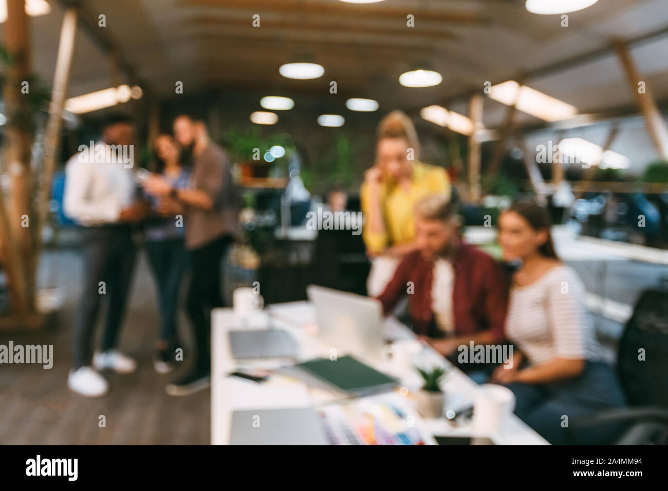 Creative people working at workplace in office, blurred photo Stock ...