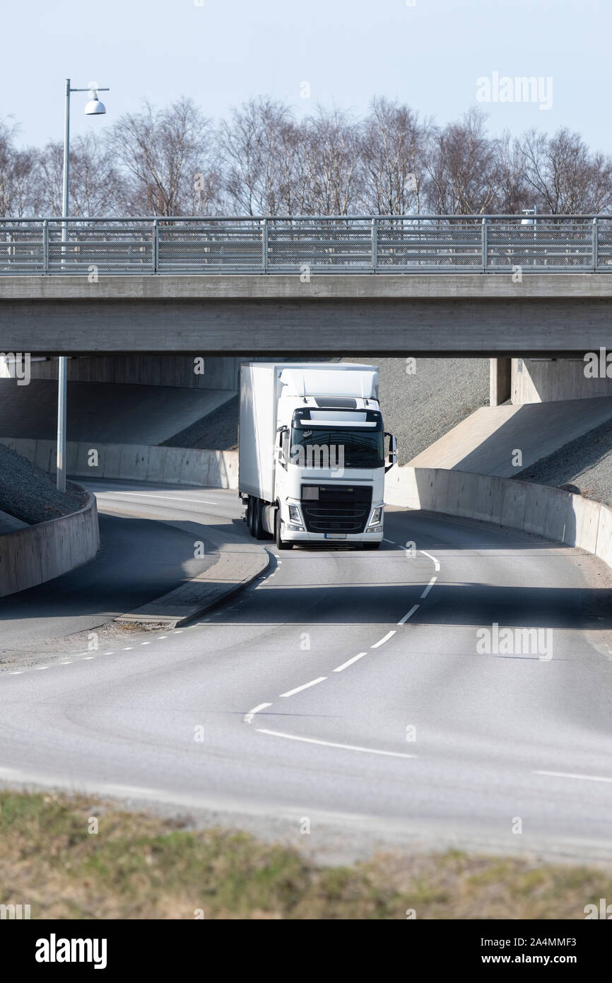 Lorry under viaduct Stock Photo - Alamy