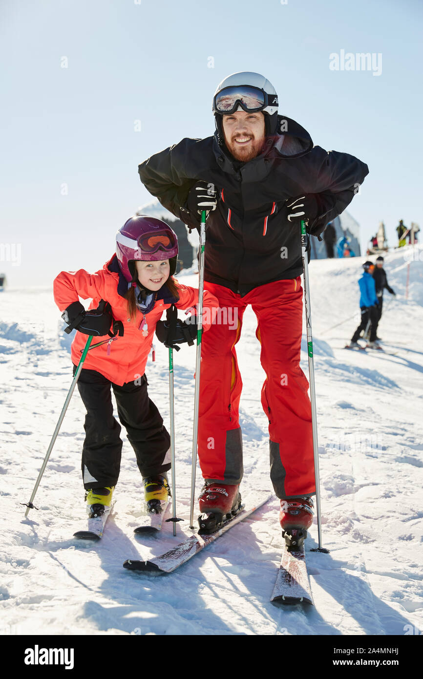Father and son skiing Stock Photo - Alamy