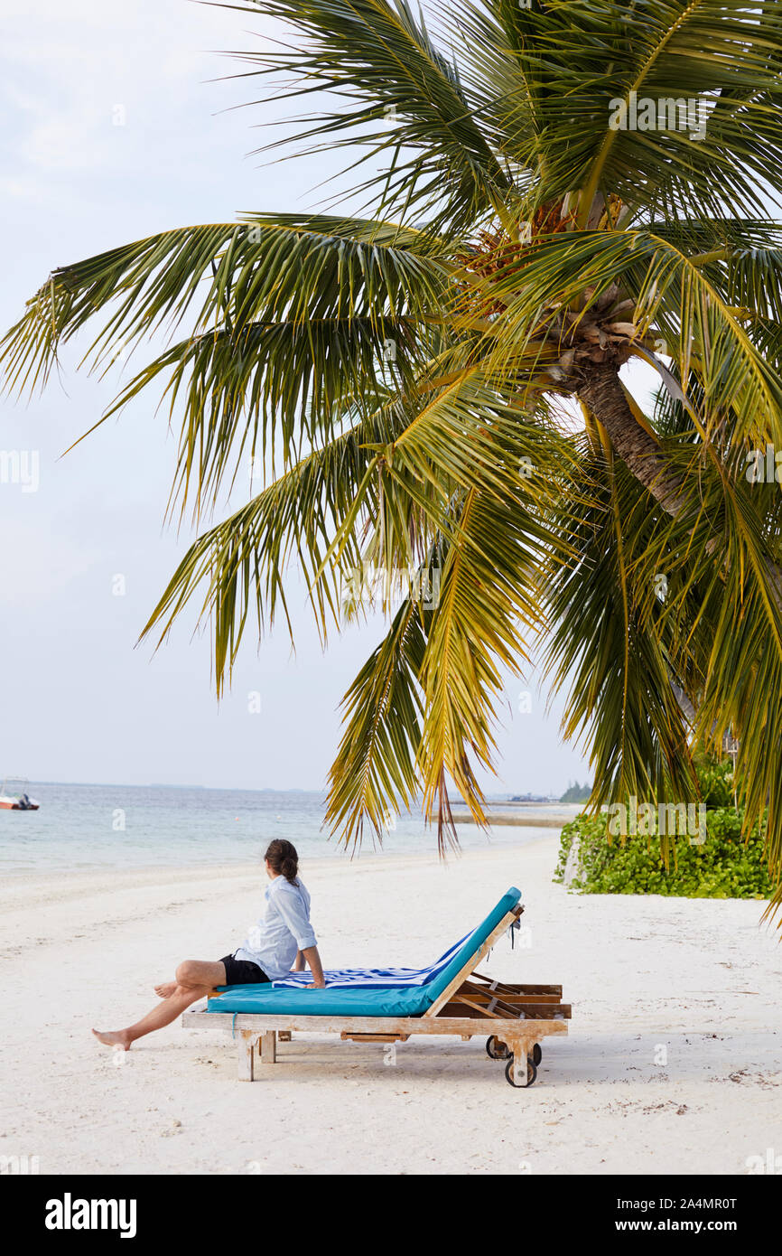 Man on beach Stock Photo - Alamy