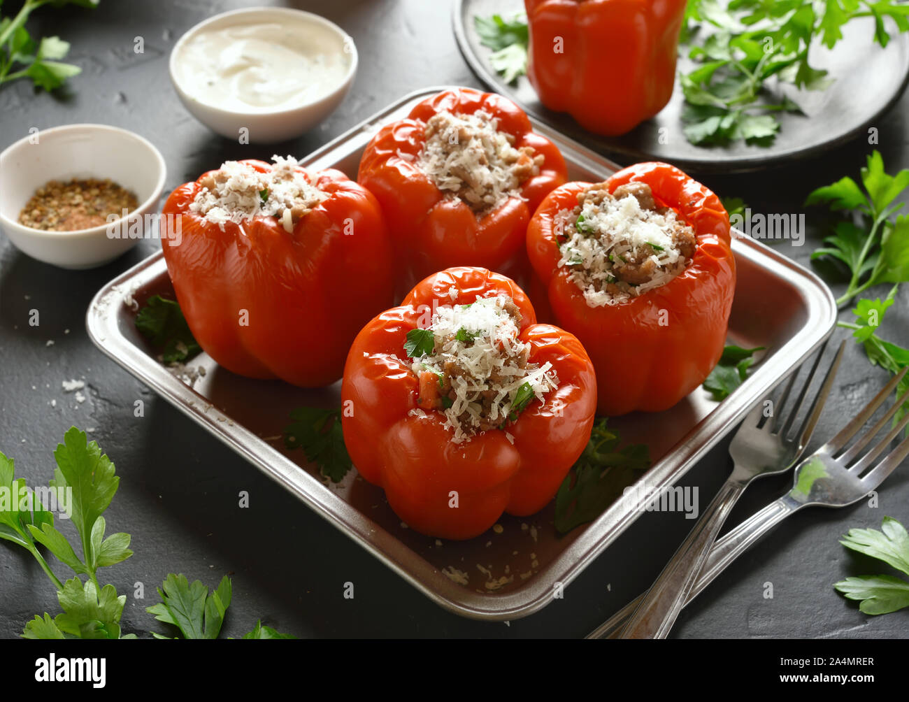 Stuffed red peppers with minced meat, rice, onion, parmesan cheese ...
