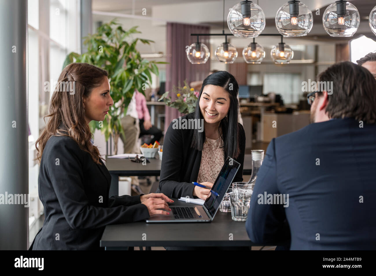 People talking in office Stock Photo - Alamy