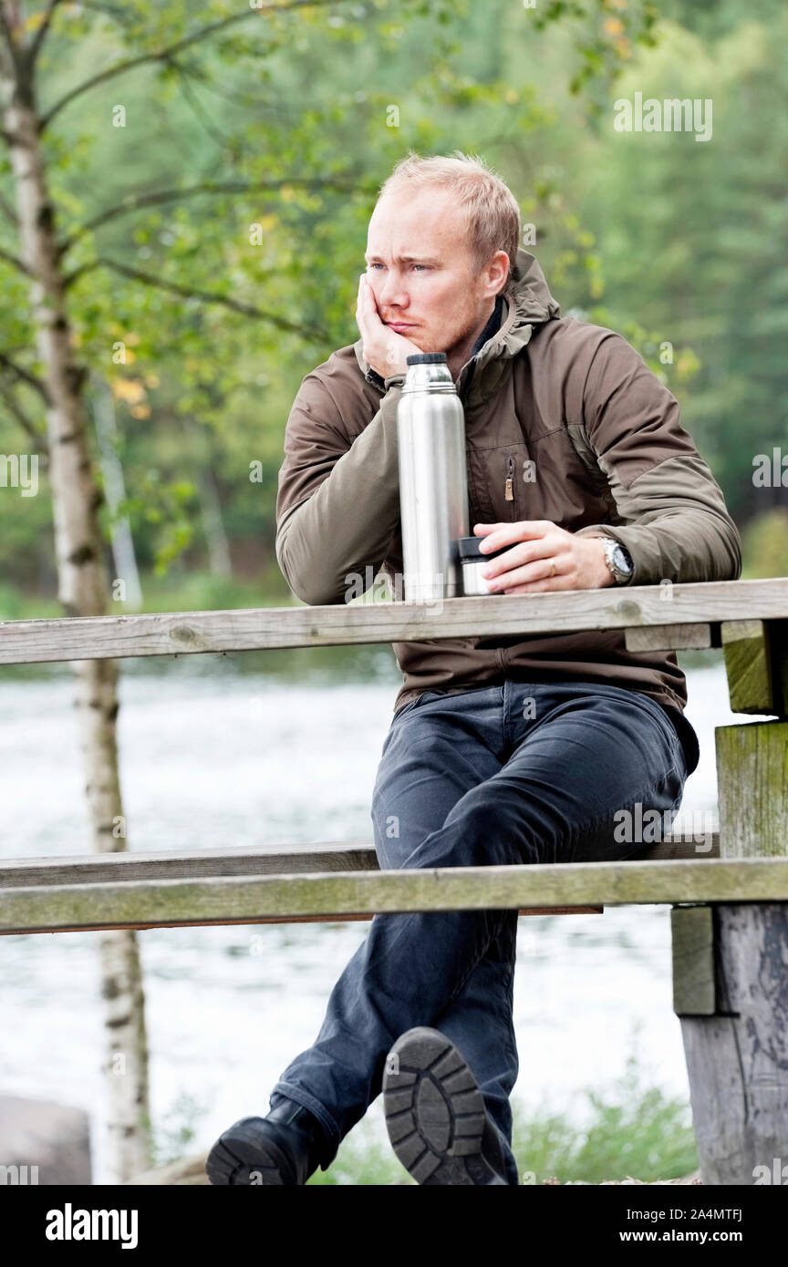 Man resting on picnic table hi-res stock photography and images - Alamy