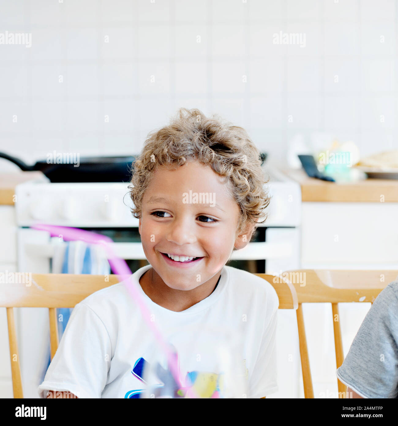 Boy in dining room hi-res stock photography and images - Alamy