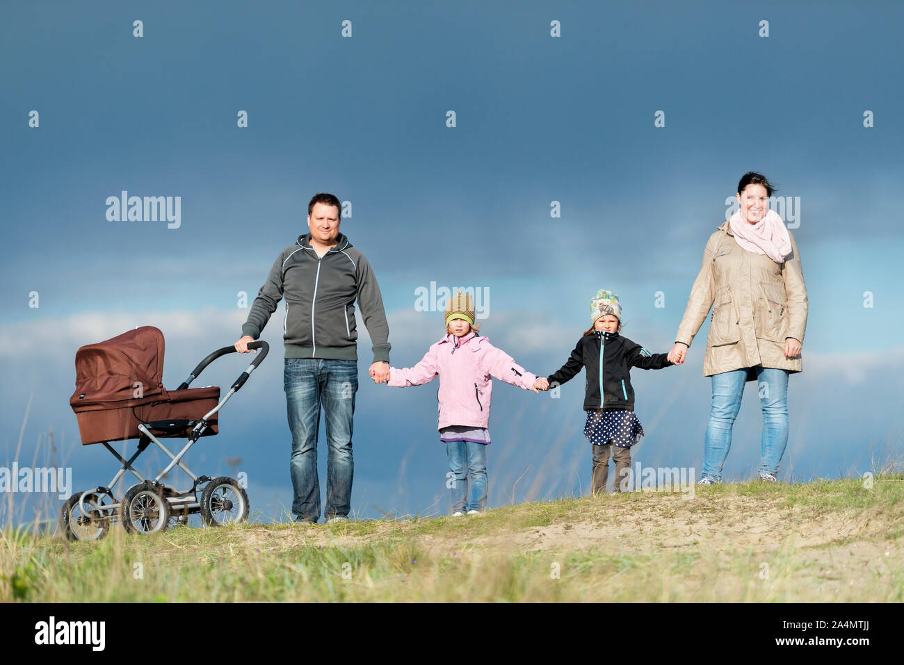 Family walking together Stock Photo - Alamy