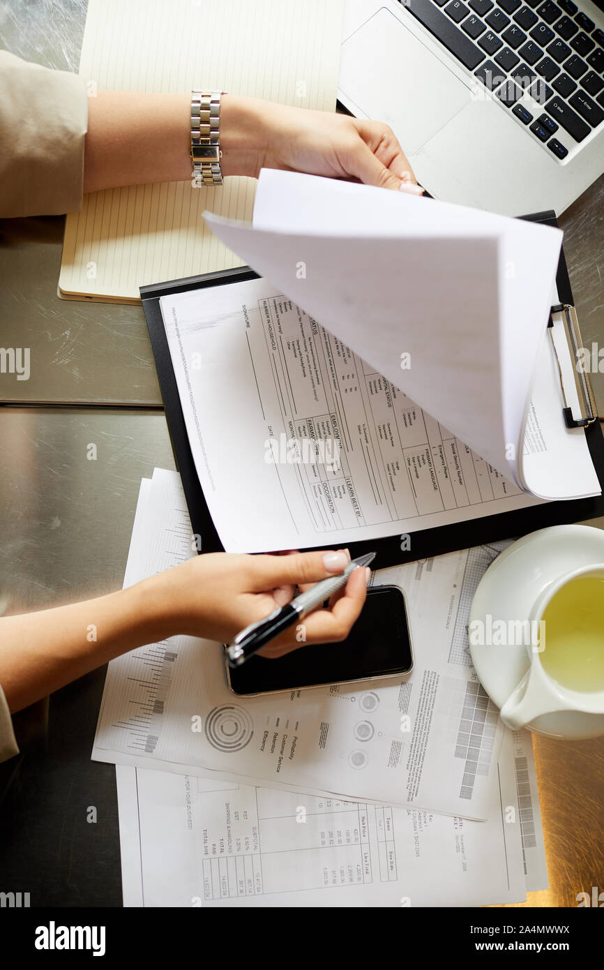 Businesswoman signing documents close hi-res stock photography and ...