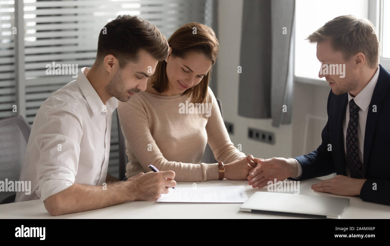 Woman man signing contract hi-res stock photography and images - Alamy