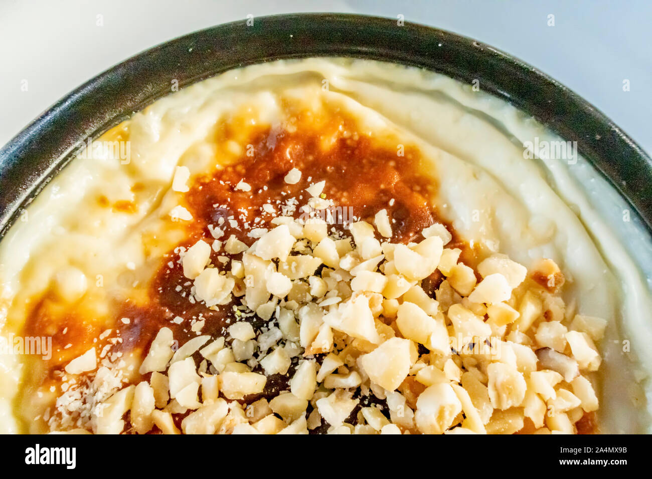 traditional turkish dessert rice pudding.close up ready to eat turkish ...