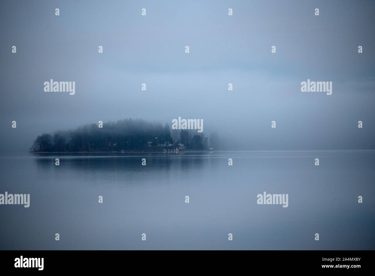 Fog over lake Stock Photo - Alamy