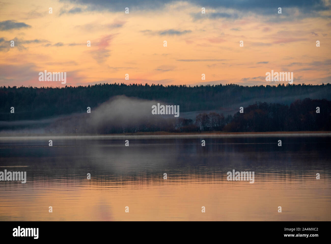 Sunset at lake Stock Photo - Alamy