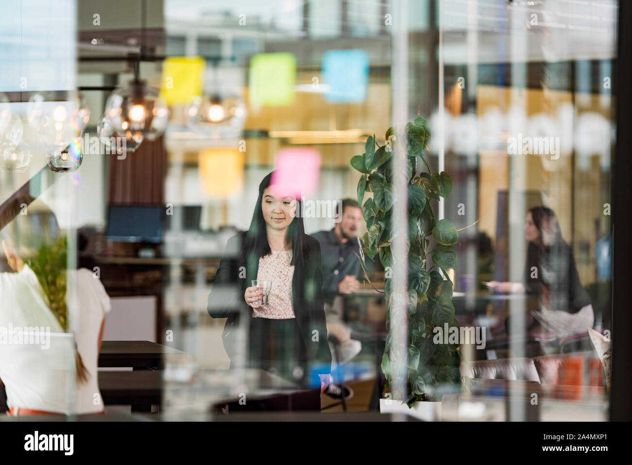 Woman in cafeteria Stock Photo - Alamy