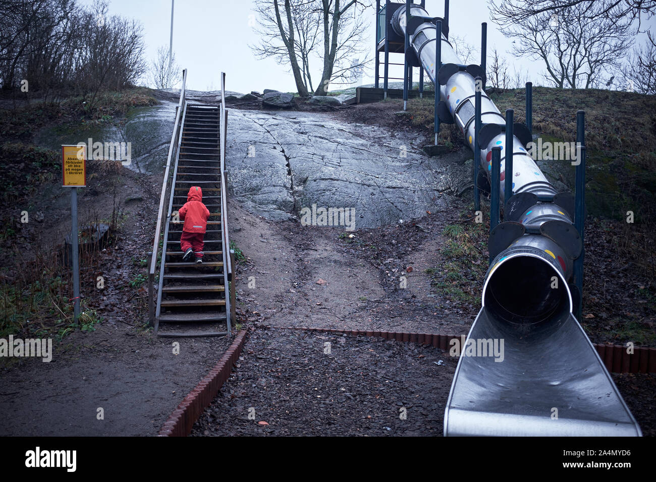 Child waling up stairs Stock Photo - Alamy