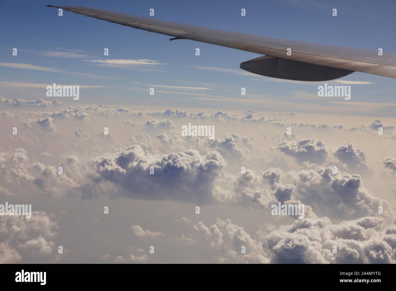 Clouds and plane wing Stock Photo - Alamy